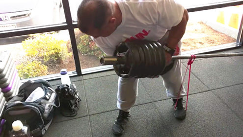 Tip: Single-Arm Barbell Row with Band